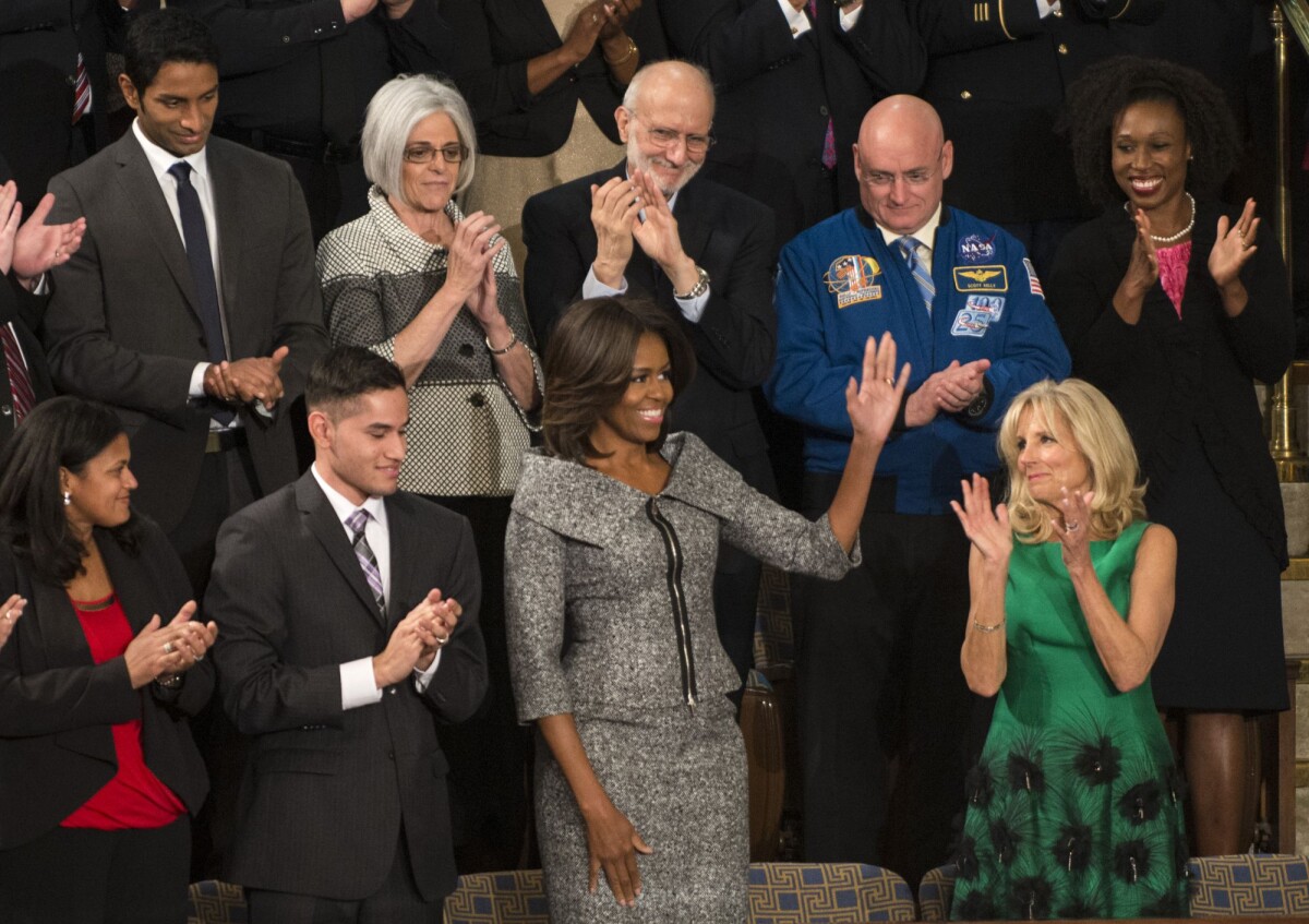 Photo : La First Lady Michelle Obama écoute son mari Barack Obama lors ...