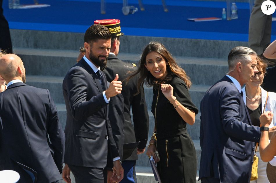 Olivier Giroud et sa femme Jennifer lors du défilé militaire du 14 ...