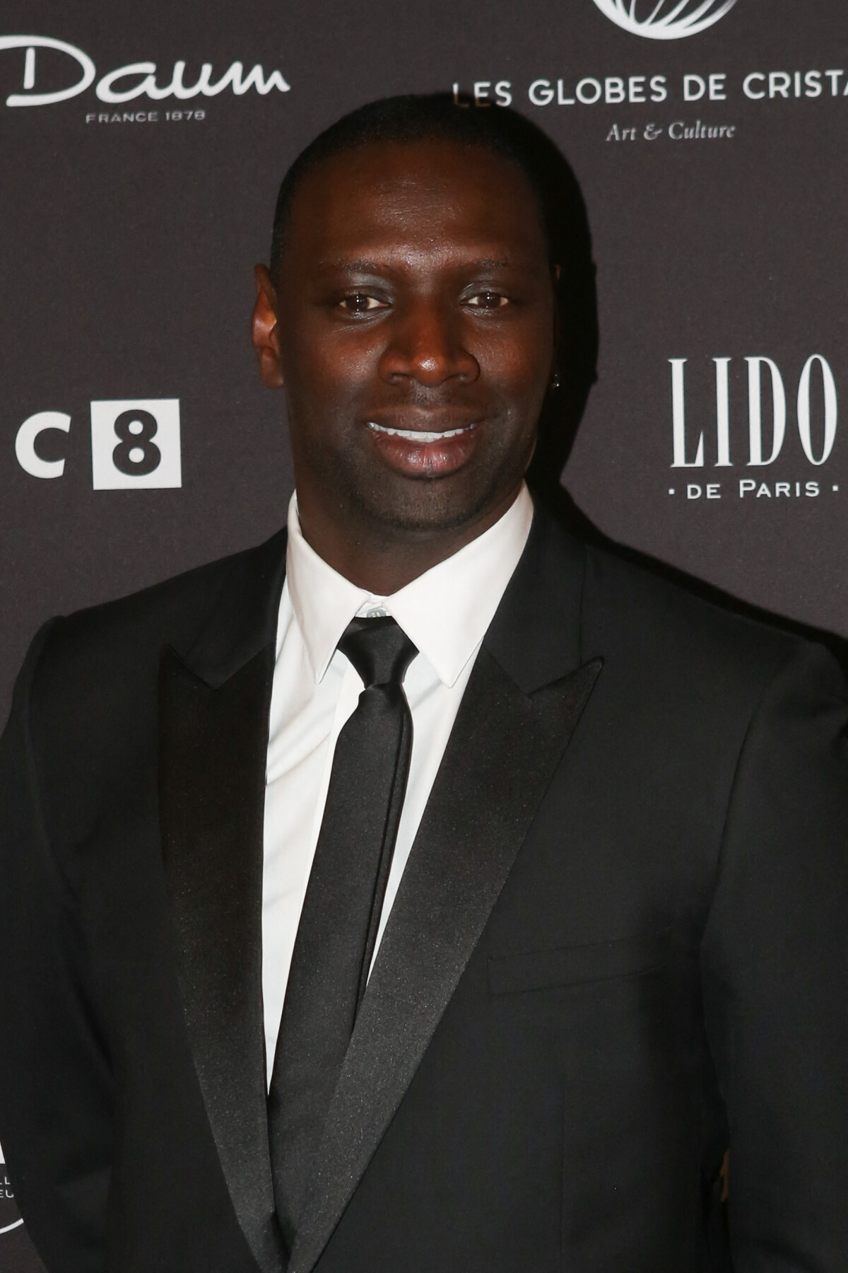 Photo : Omar Sy au photocall de la 11ème cérémonie des Globes de ...