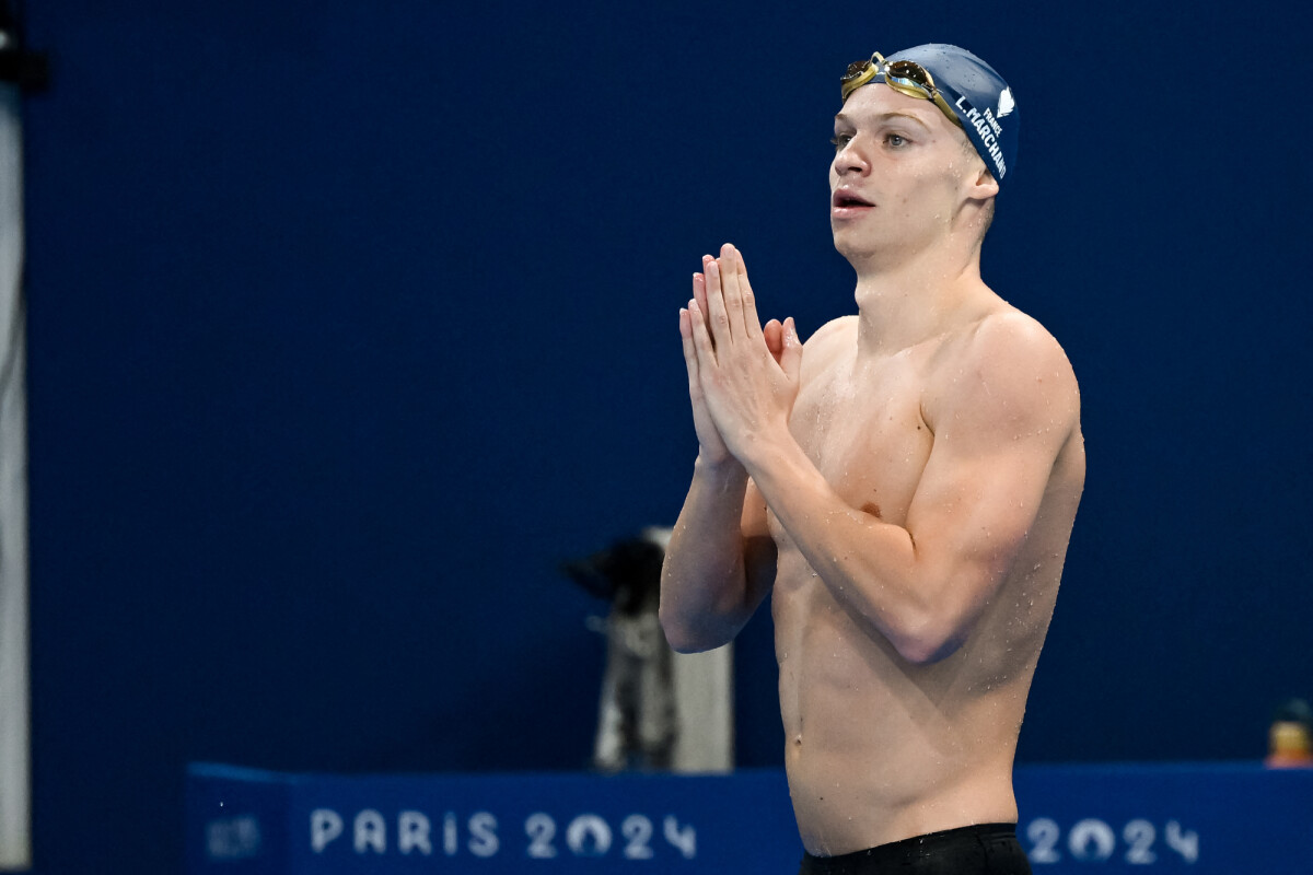 Photo : Leon Marchand of France celebrates after winning the gold medal ...