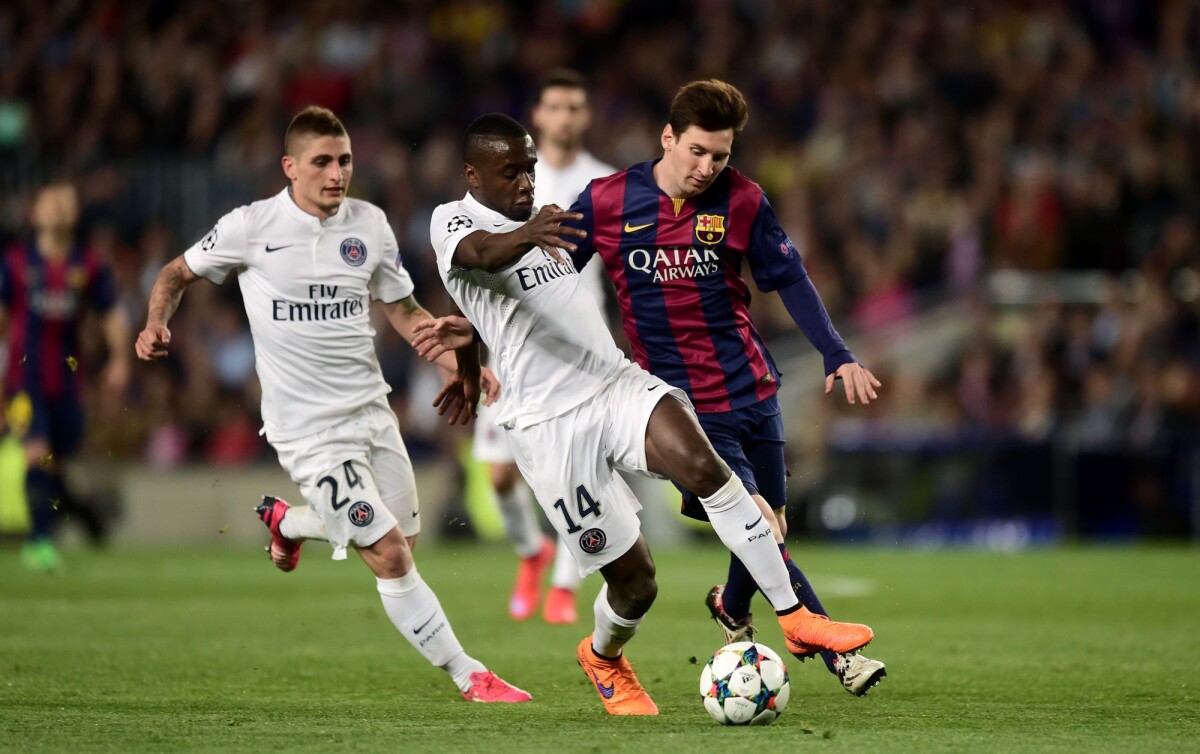 Photo : Barcelona's Lionel Messi (right) and Paris Saint-Germain's ...