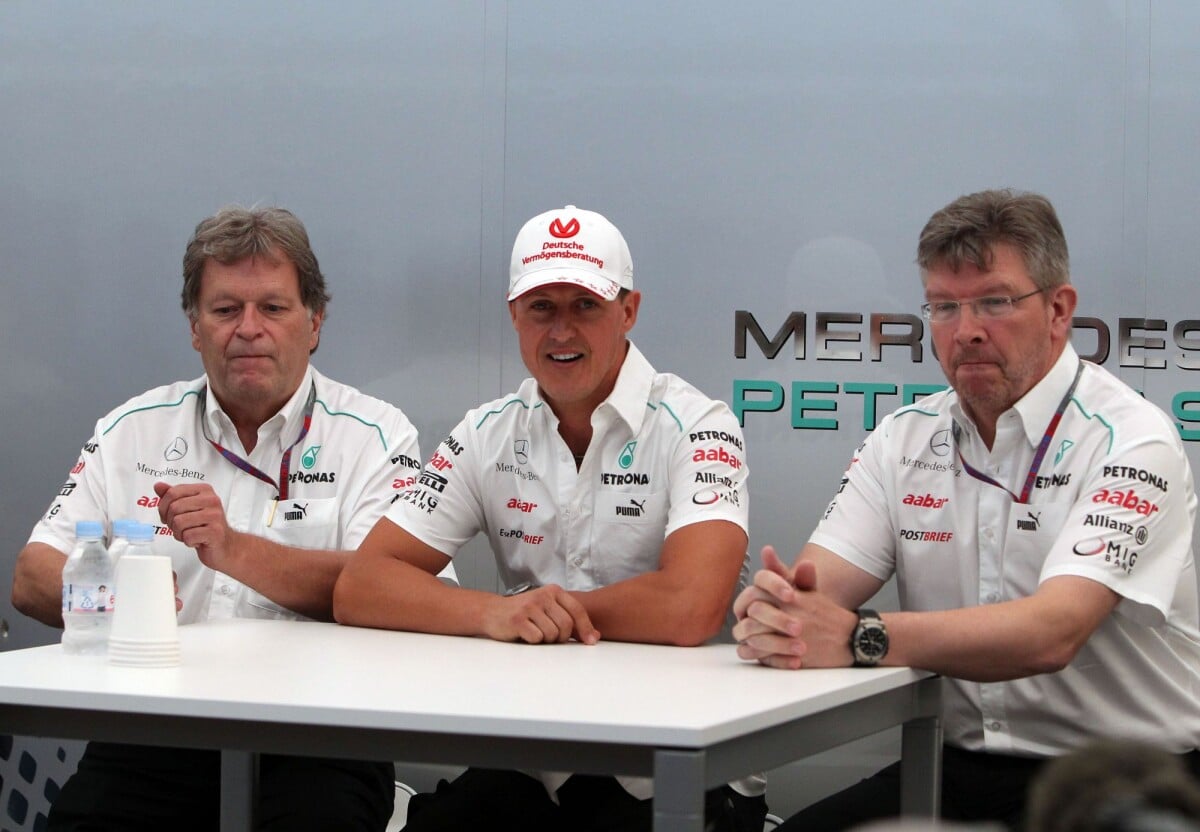 Photo : Michael Schumacher avec Norbert Haug et Ross Brawn lors du ...