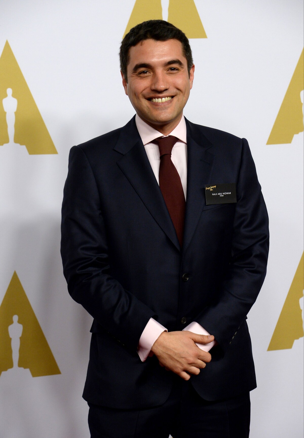 Photo : Director Naji Abu Nowar attends the 88th annual Academy Awards ...