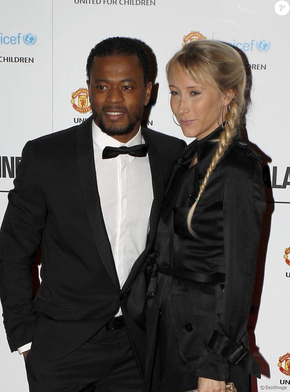 Patrice Evra et sa femme Sandra lors du diner de gala de charite pour l ...