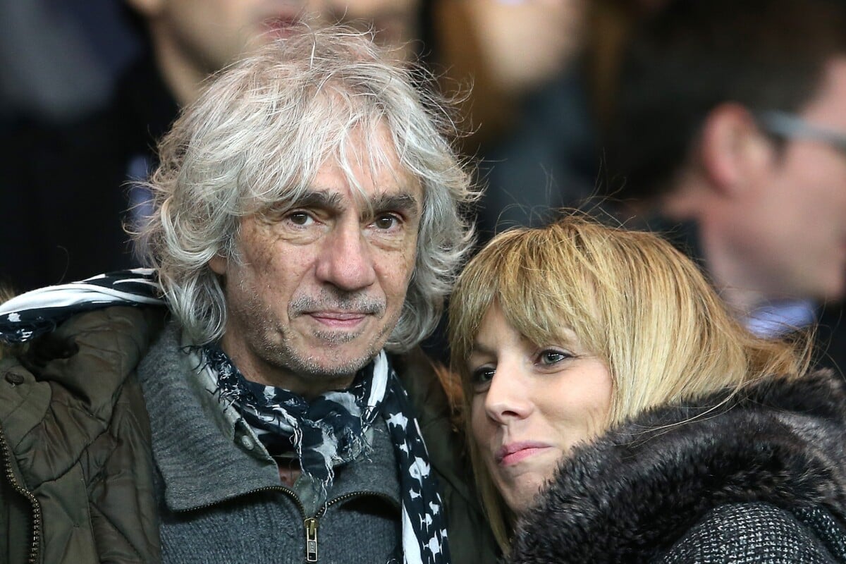 Photo : Louis Bertignac et sa compagne Laetitia au match de coupe de la ligue entre le PSG et ...