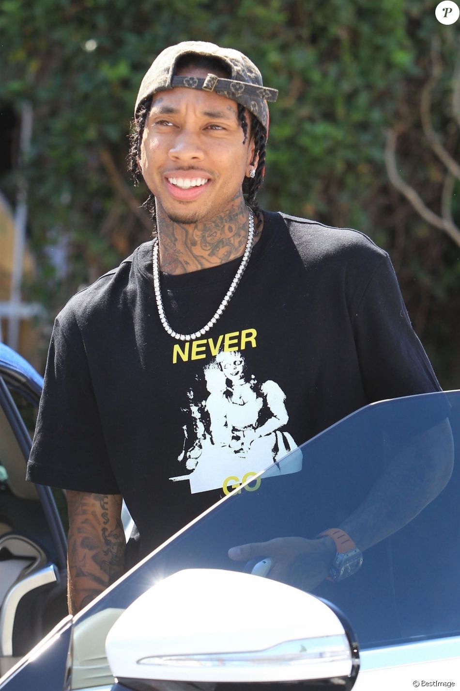 Tyga est allé déjeuner avec des amis au restaurant Il Pastaio à Beverly ...