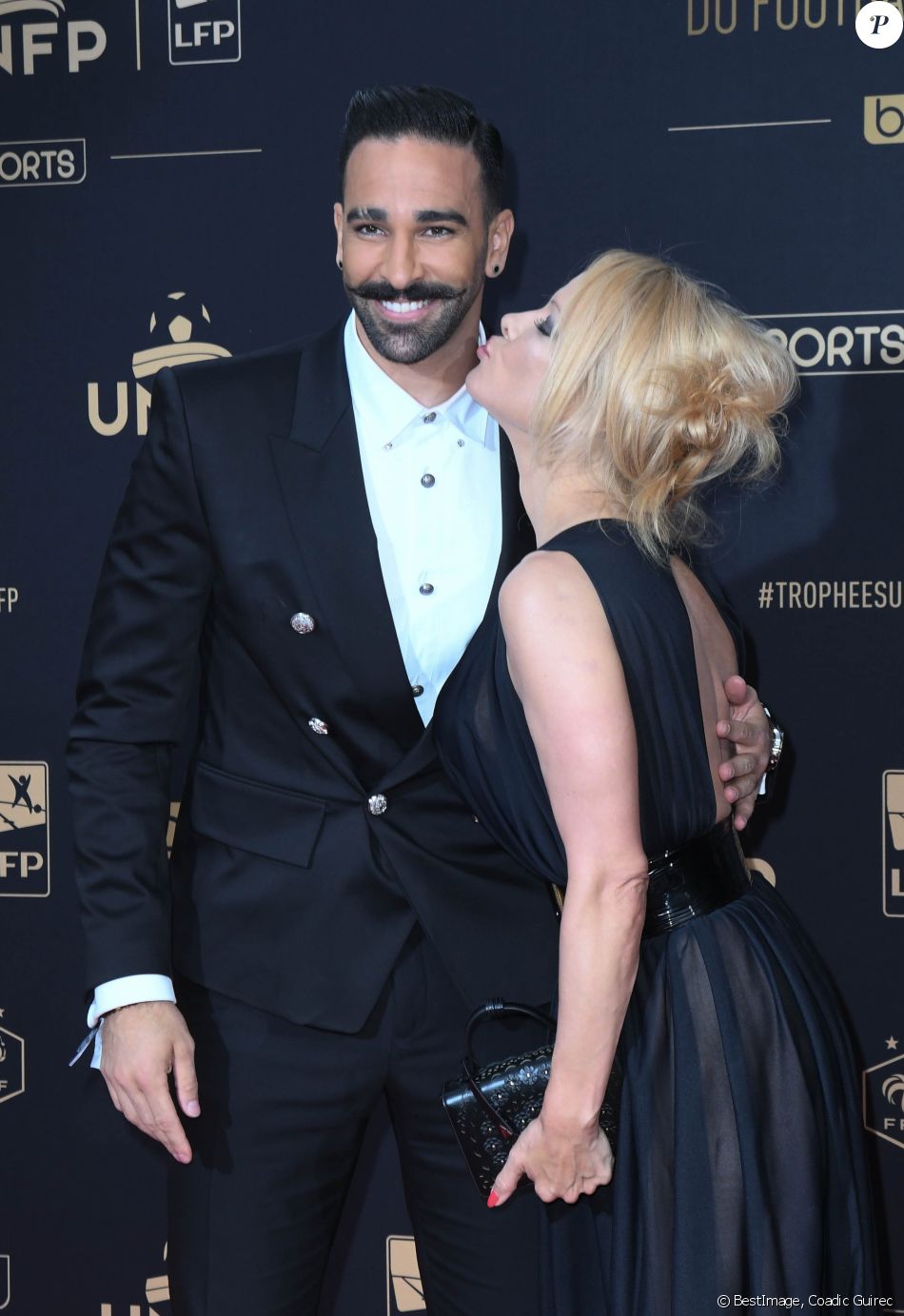 Adil Rami et sa compagne Pamela Anderson au photocall de la 28ème ...