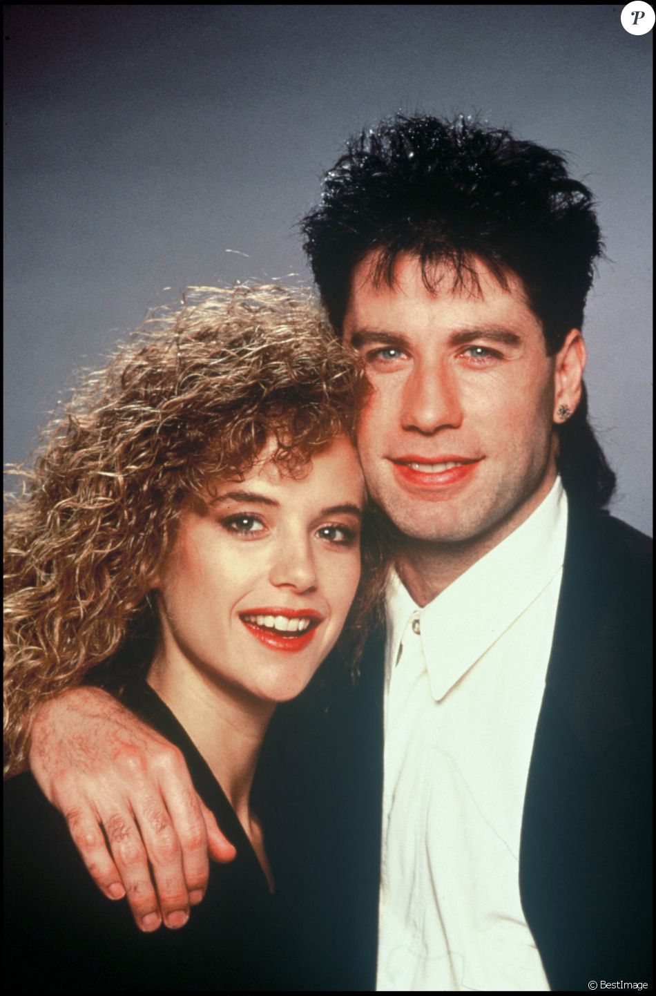 Kelly Preston et John Travolta dans le film Les Experts en 1989 ...