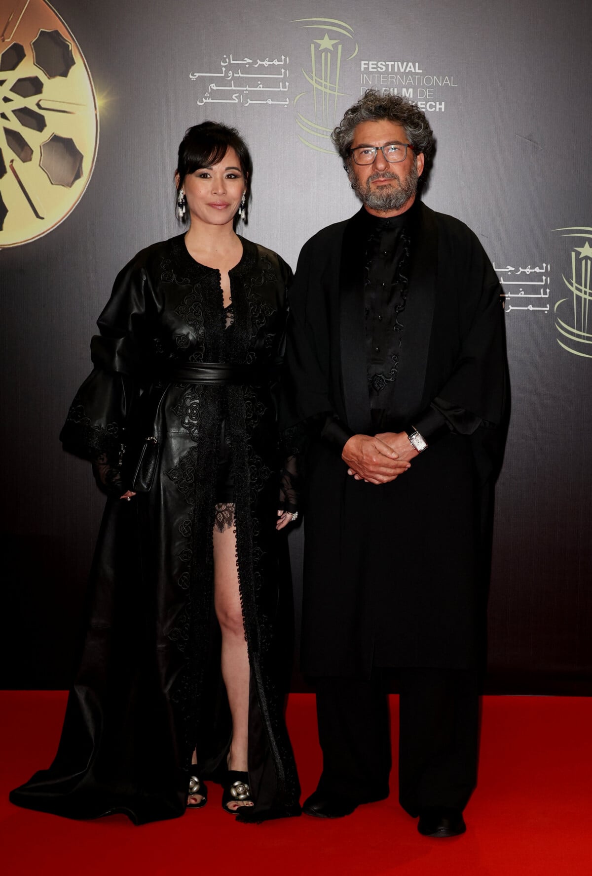 Photo : Radu Mihaileanu et sa compagne au photocall de cérémonie de ...