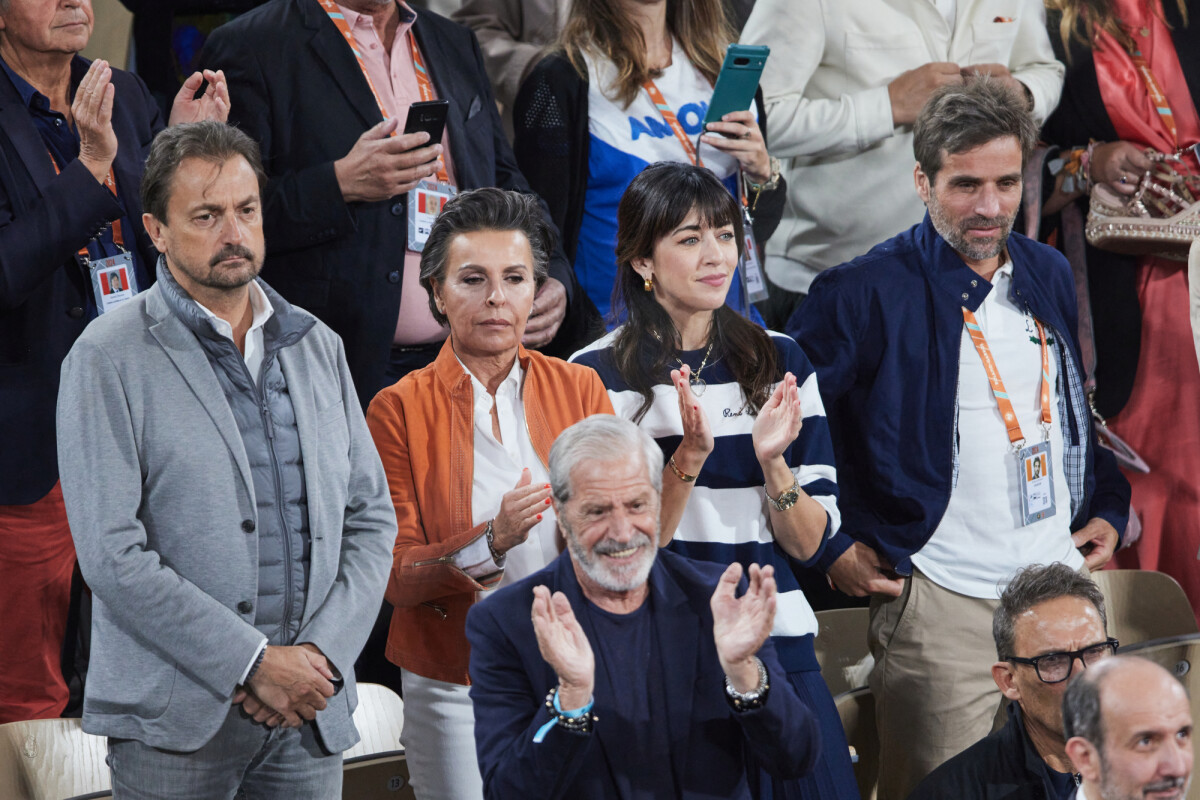 Photo : À côté d'eux, il y avait Henri Leconte et sa compagne Maria ...