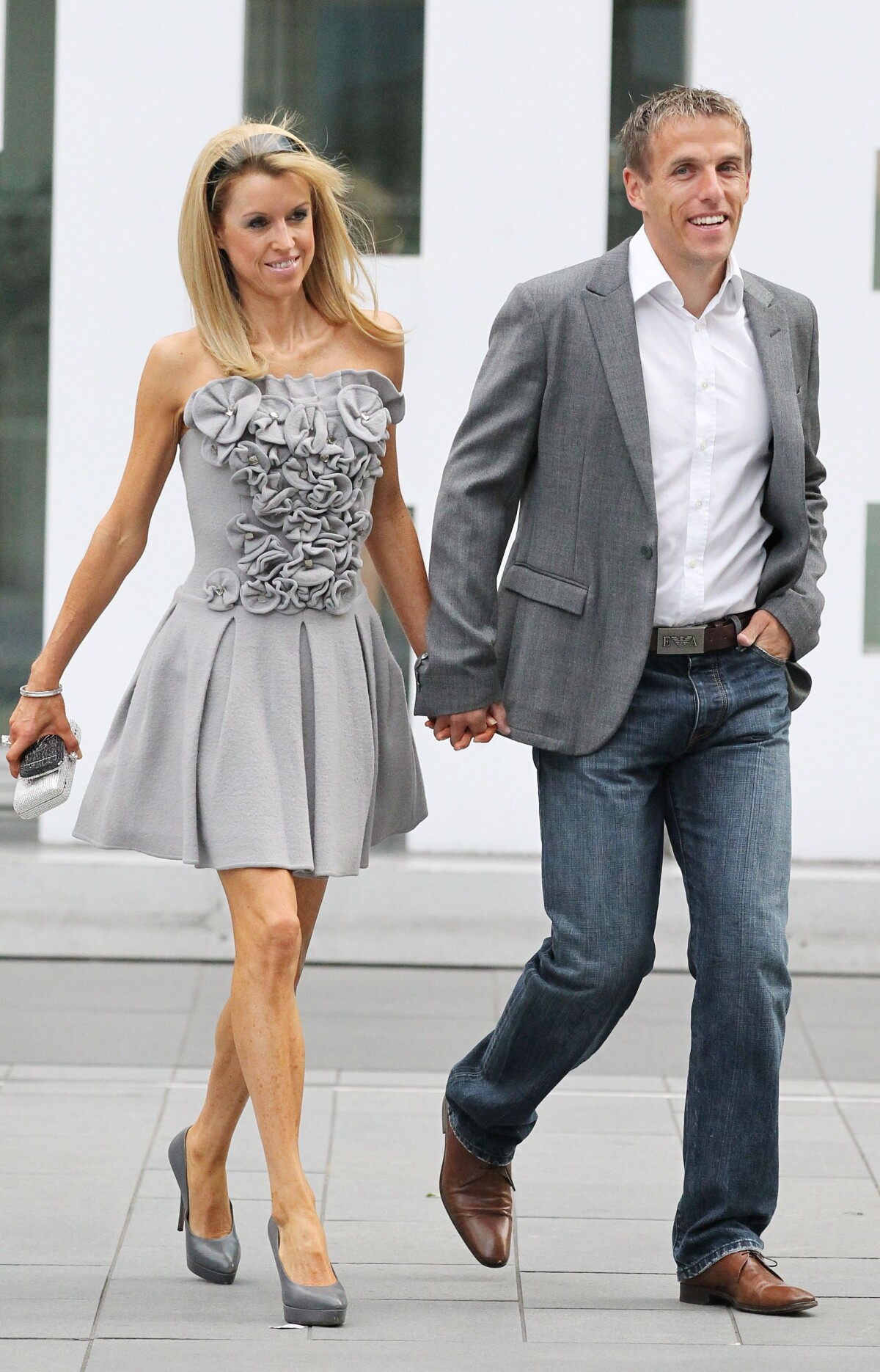 Photo : Phil et Julie Neville dans les rues de Manchester, le 20 août ...