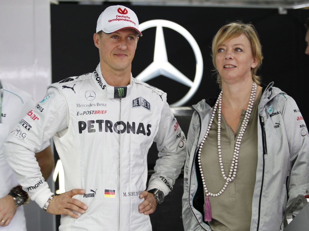 Photo : Michael Schumacher et son attachée de presse Sabine Kehm à Sao ...