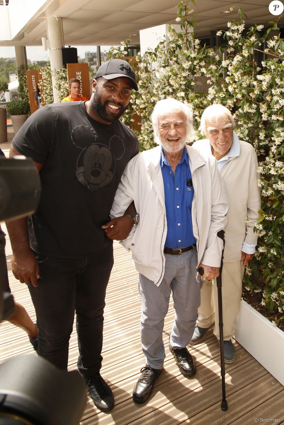 Teddy Riner, Jean-Paul Belmondo, Charles Gérard au village lors des ...