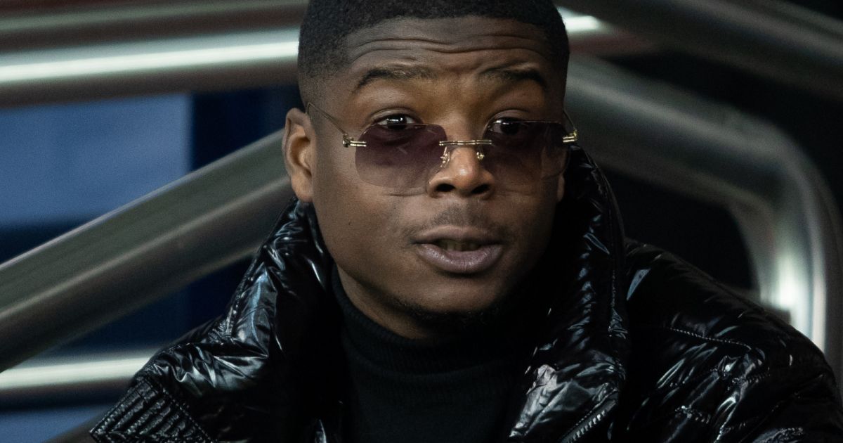 Le rappeur Ninho dans les tribunes lors du match de Ligue 1 opposant le ...