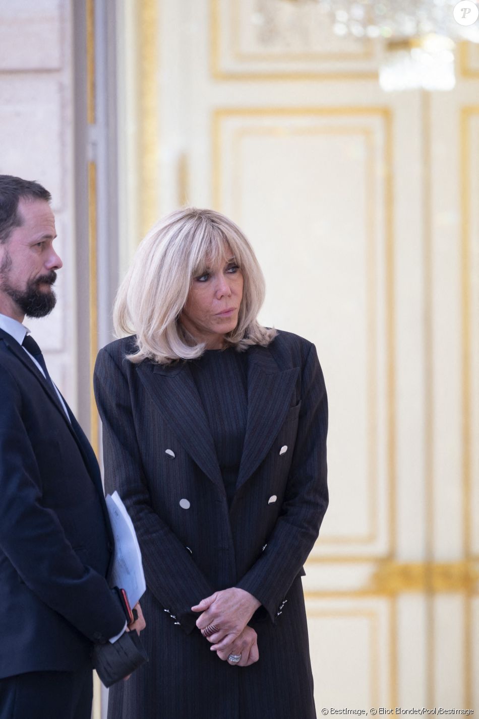 Le chef de cabinet du président, Brice Blondel et la Première Dame ...