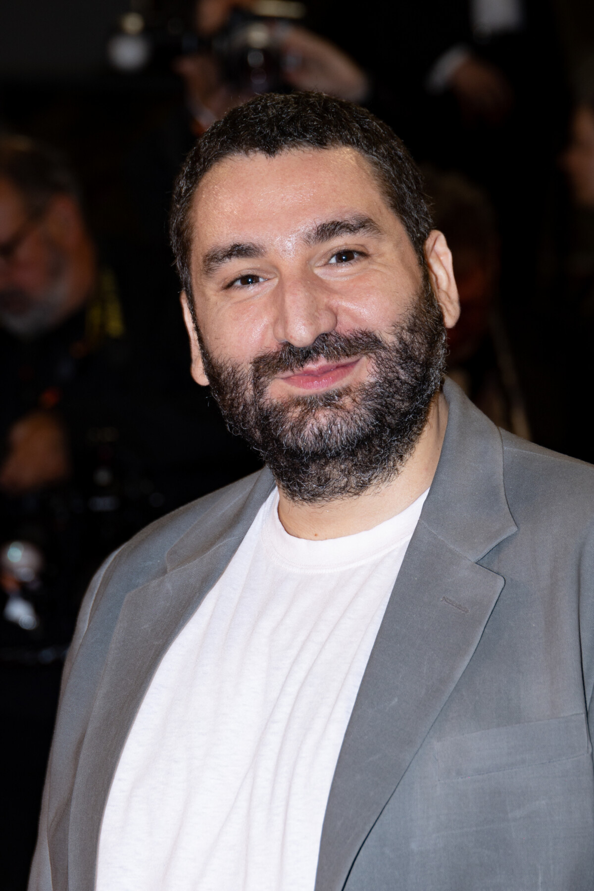 Photo : Mouloud Achour - Montée des marches du film " Omar la fraise ...
