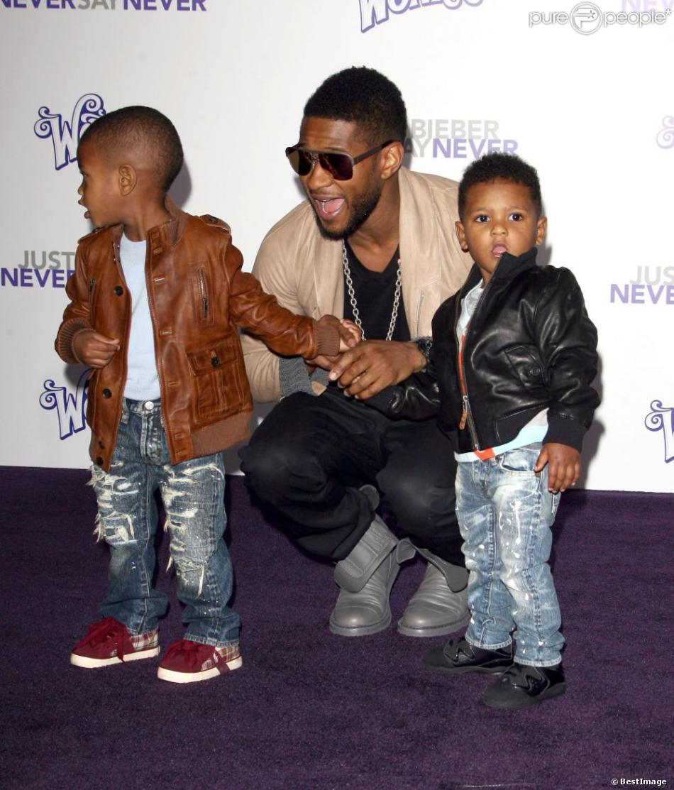 Usher et ses fils en février 2011 - Purepeople