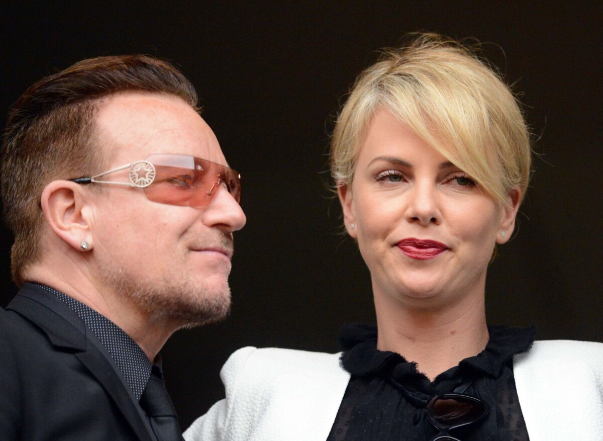 Photo : Bono et Charlize Theron lors de l'hommage à Nelson Mandela au ...