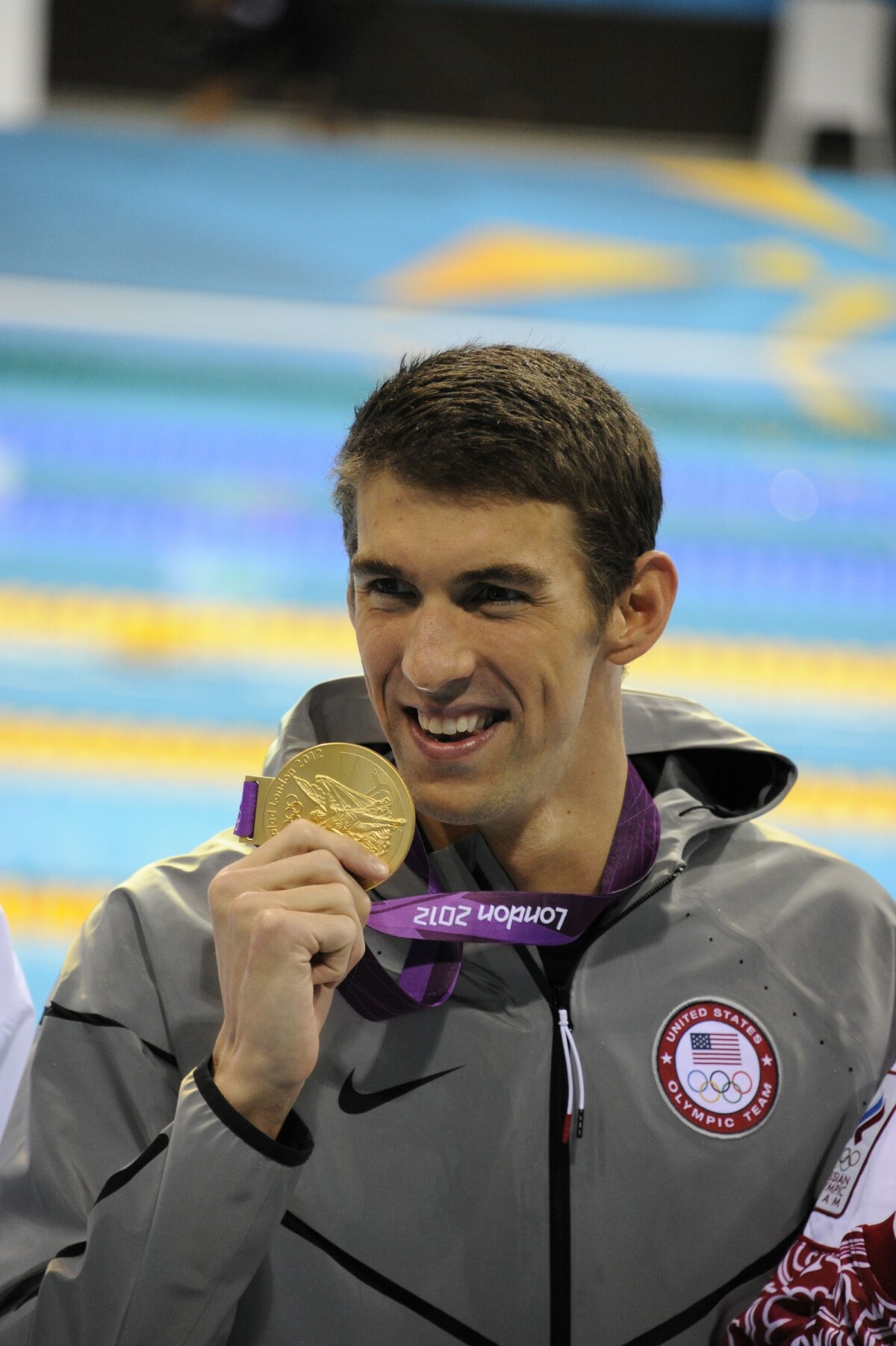 Photo : Michael Phelps après sa victoire sur le 100m papillon aux JO de ...