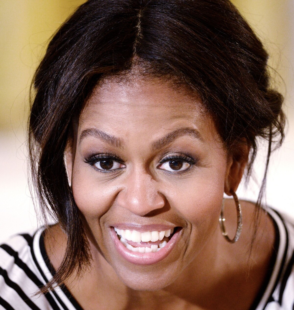 Photo : Michelle Obama partage un repas avec des enfants, après avoir ...