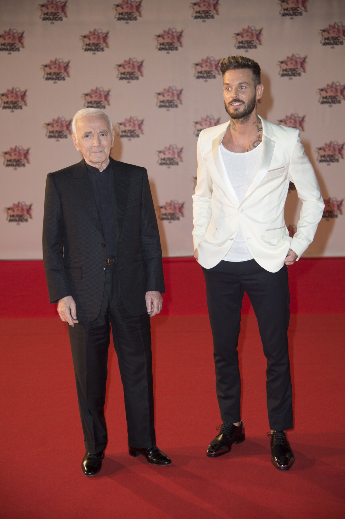 Photo : Charles Aznavour et M. Pokora, à leur arrivée à la 17e ...