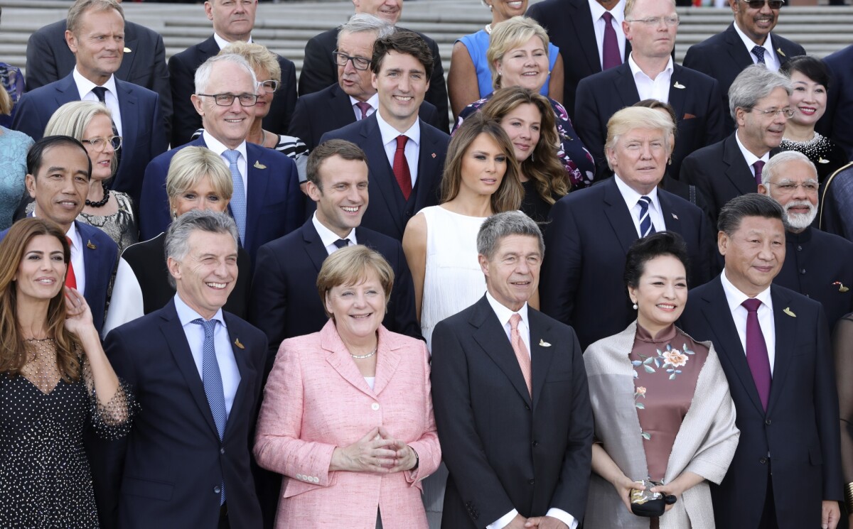 Photo : Juliana Awada, Mauricio Macri, Angela Merkel, son amri Joachim ...