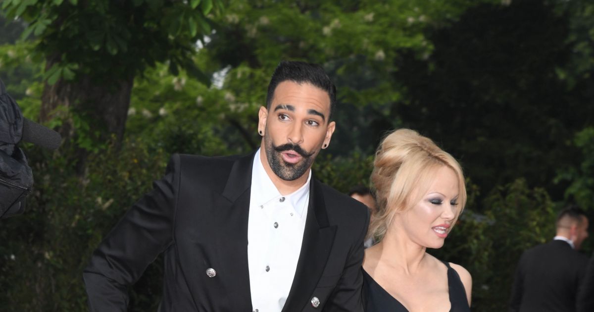 Adil Rami et sa compagne Pamela Anderson arrivent à la 28ème cérémonie ...