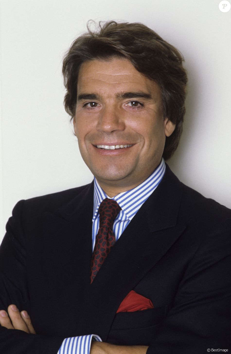 En France, à Paris, Bernard Tapie posant le 26 septembre 1986. - Purepeople