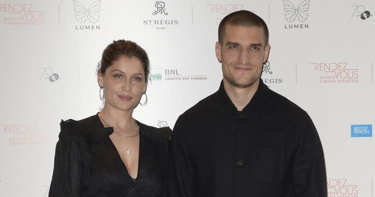 Laetitia Casta, Louis Garrel lors du photocall du film l'homme fidèle à ...
