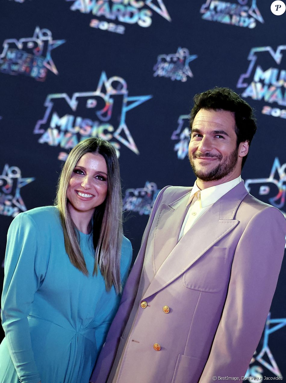 Amir et sa femme Lital au photocall de la 24ème édition des NRJ Music ...