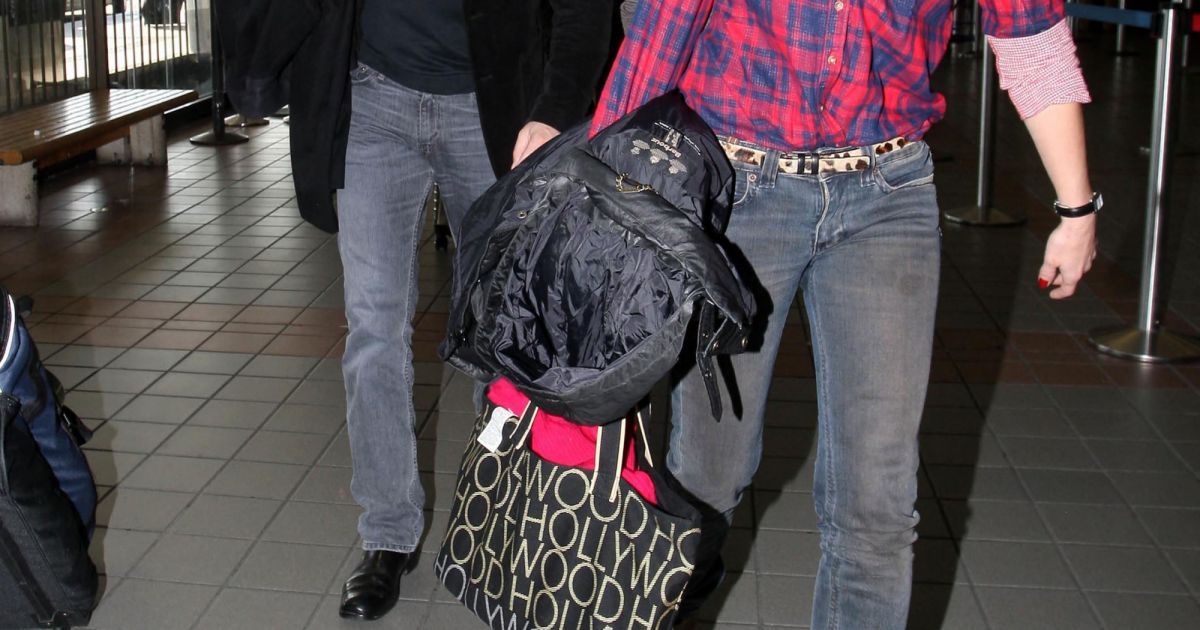 Jean Dujardin et sa femme Alexandra Lamy à l'aéroport de Los Angeles le ...