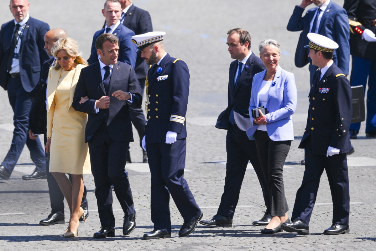 Photo : Brigitte Macron au bras d'Emmanuel Macron, président de la ...