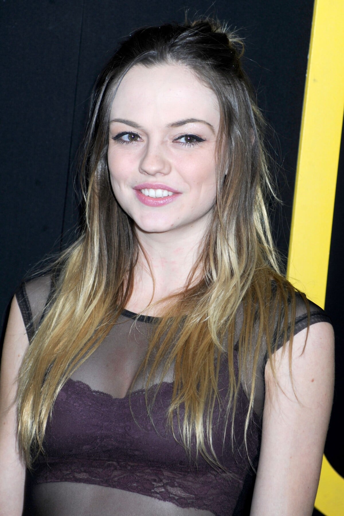 Photo : Emily Meade lors de la première du film American Bluff ...