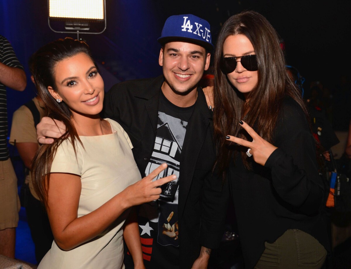 Photo : Kim, Rob et Khloé Kardashian à Miami. Septembre 2012. - Purepeople