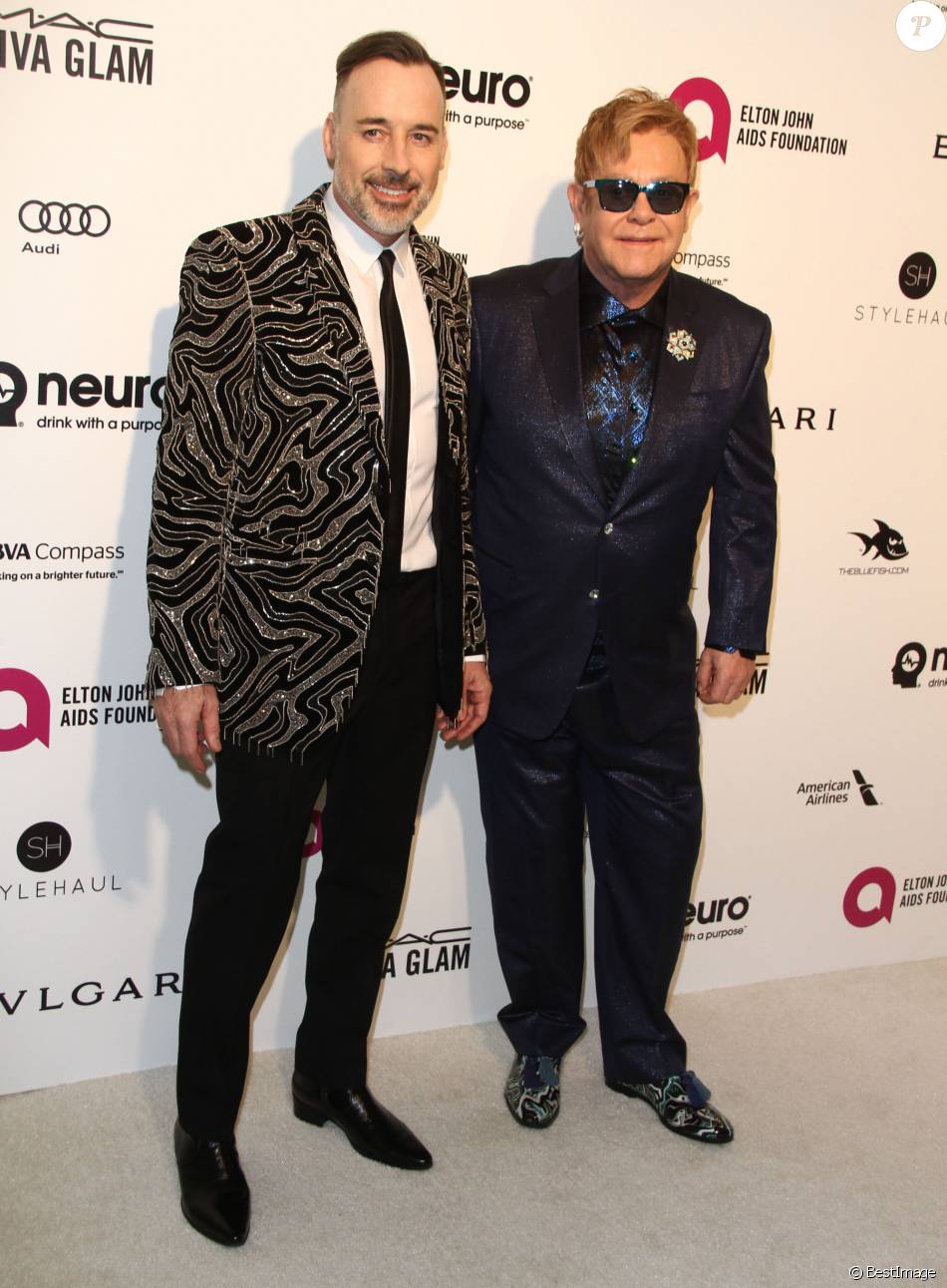 David Furnish et son mari Elton John à la soirée Elton John AIDS ...