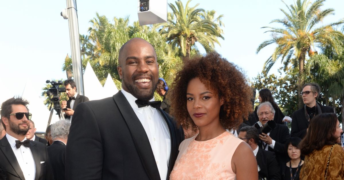 Teddy Riner et sa compagne Luthna à la montée des marches du film Elle ...