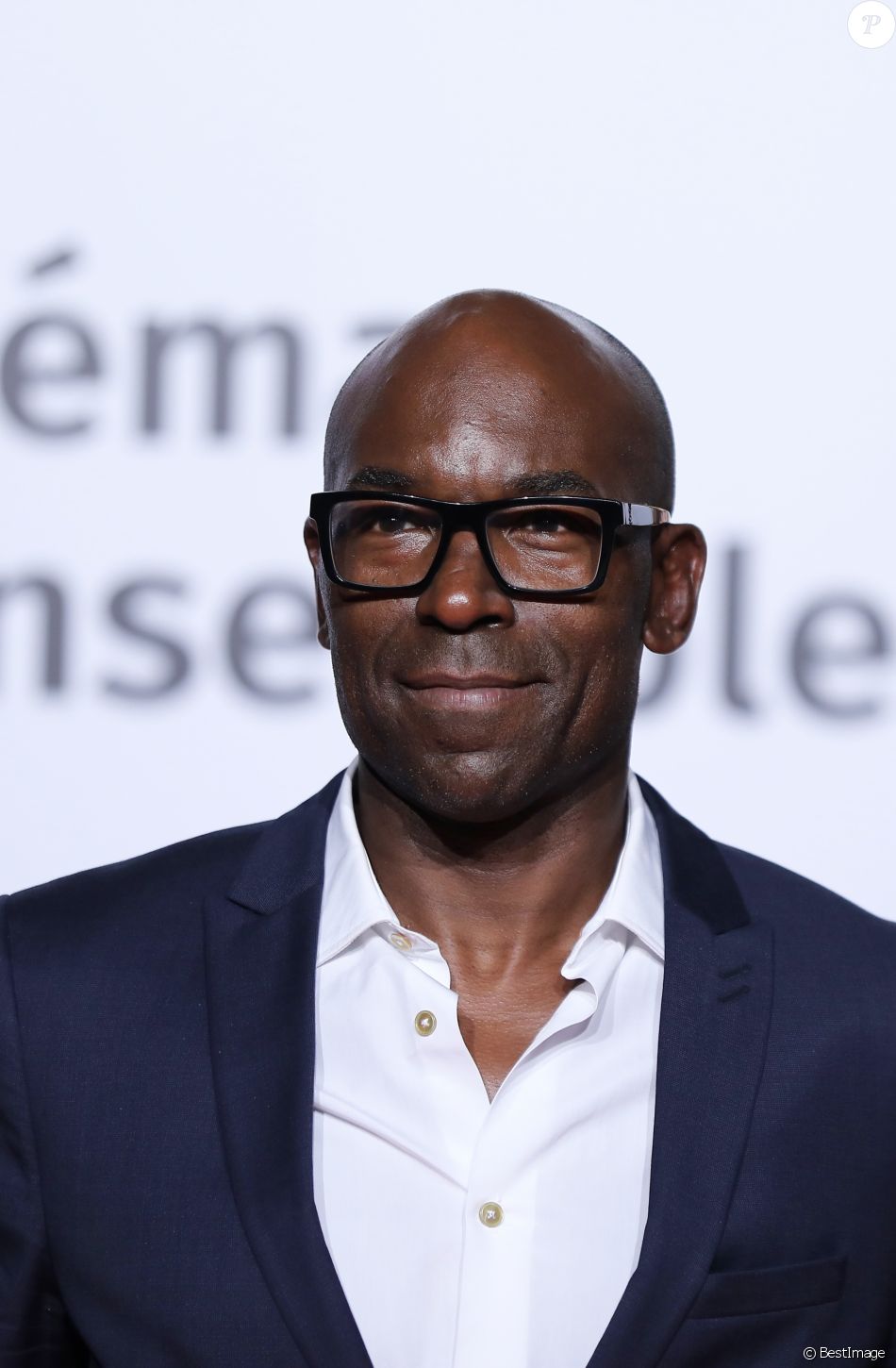 Lucien Jean-Baptiste au photocall de la cérémonie d'ouverture de la ...
