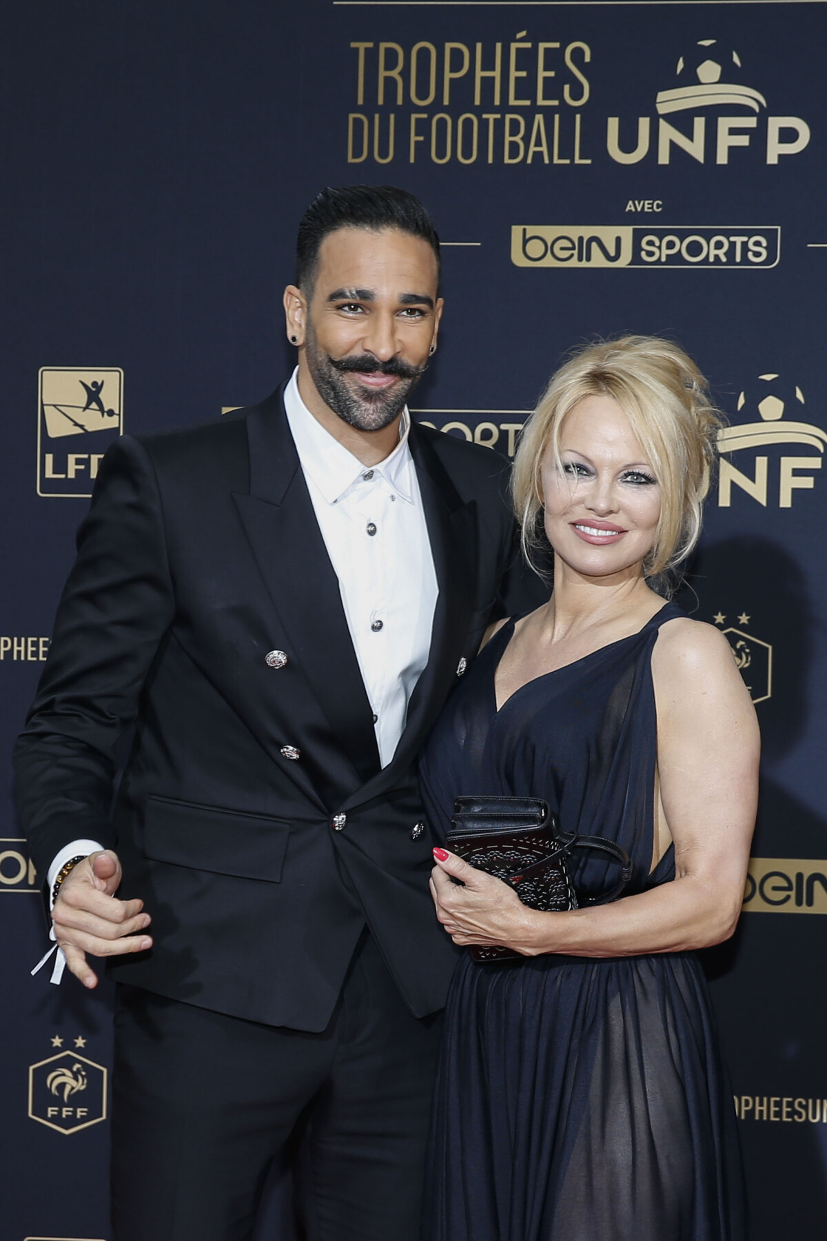 Photo : Adil Rami et sa compagne Pamela Anderson au photocall de la ...