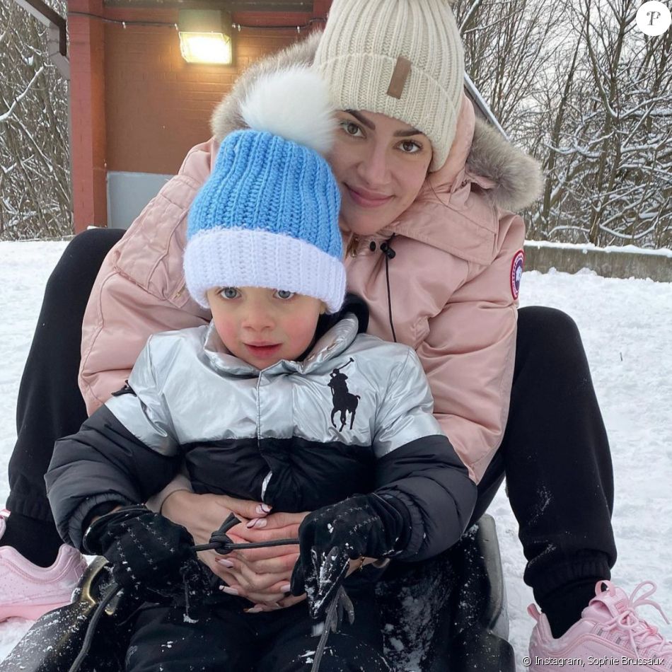 Sophie Brussaux, l'ex-compagne de Drake, et leur fils Adonis. Décembre ...