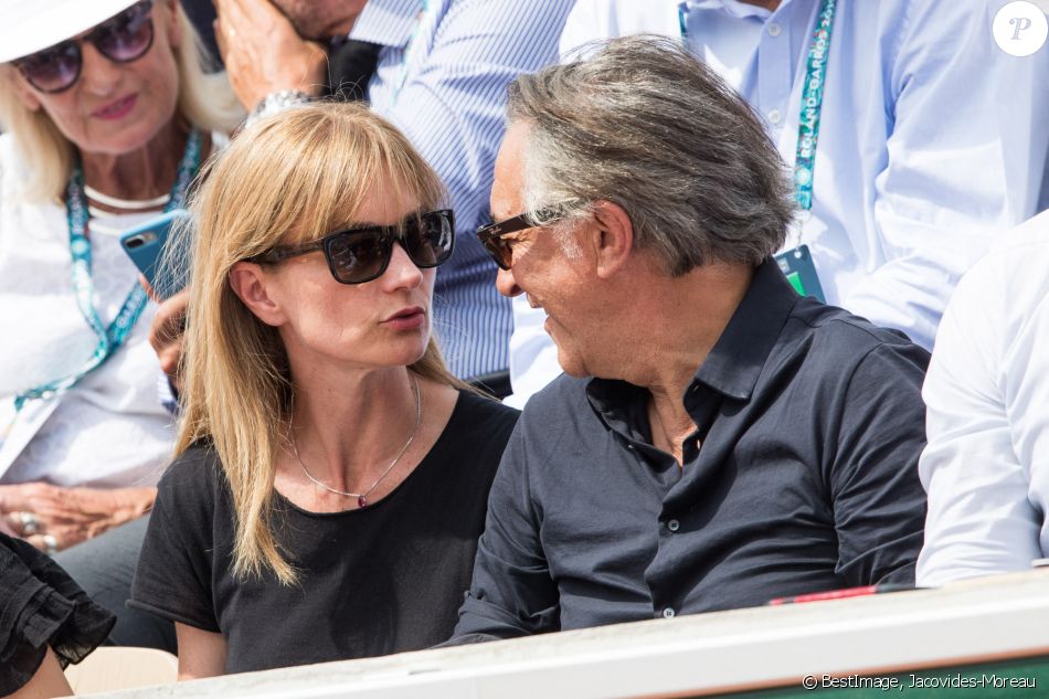 Richard Berry et sa femme Pascale Louange dans les tribunes lors des ...
