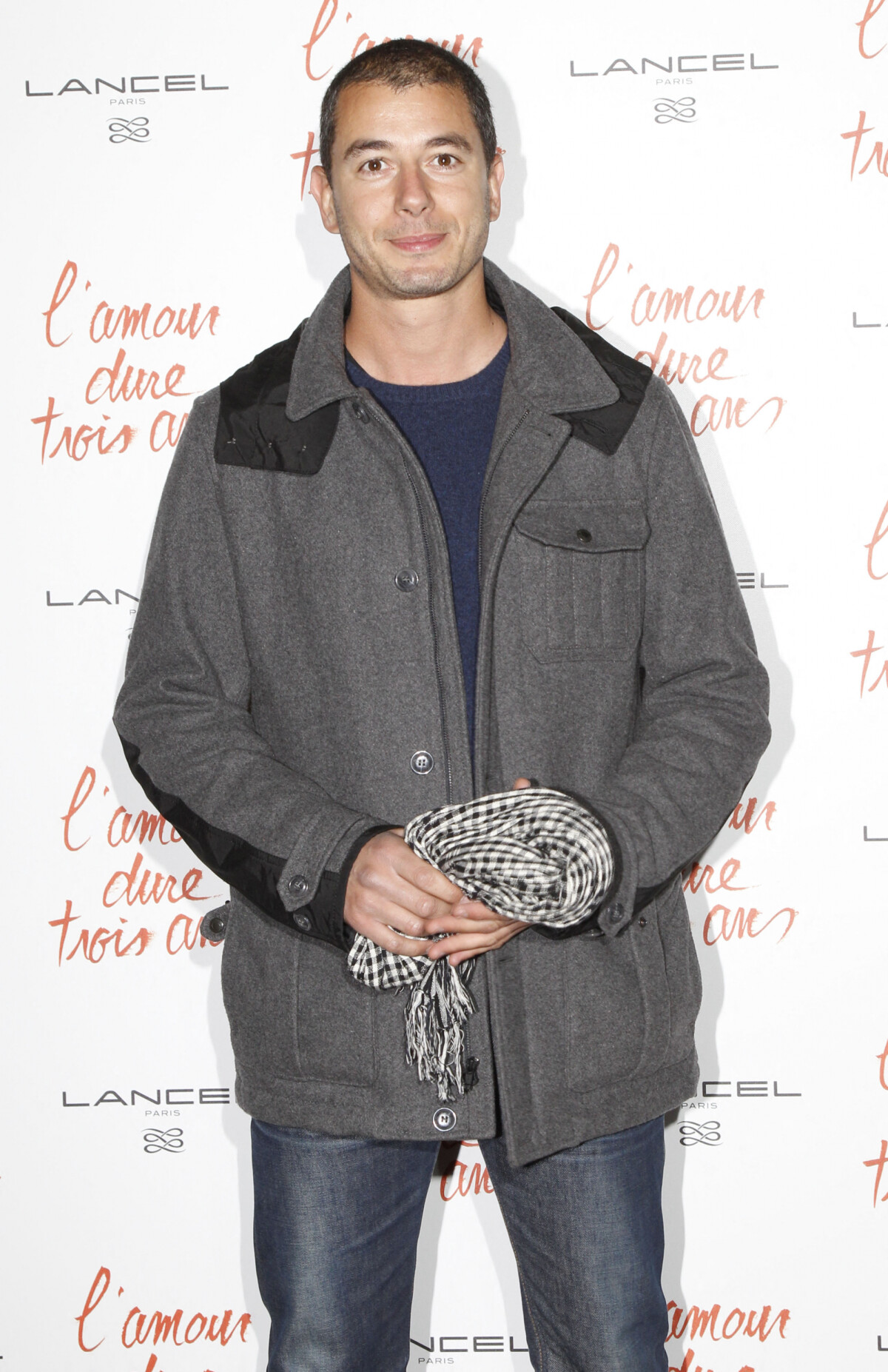 Photo : Ali Baddou lors de la première du film L'amour dure trois ans ...