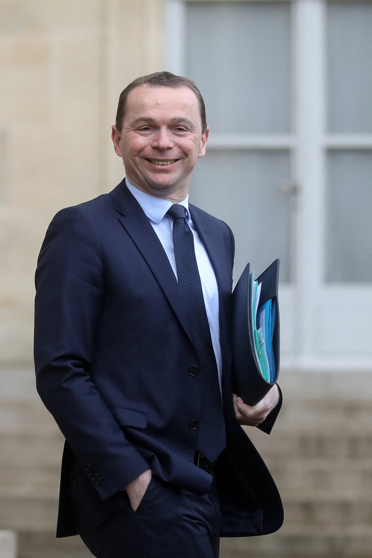 Photo : Le ministre du Travail, Olivier Dussopt à la sortie du conseil ...