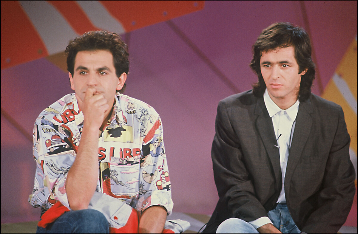 Photo : Jean-Jacques Goldman et Marc Toesca sur un plateau TV ...