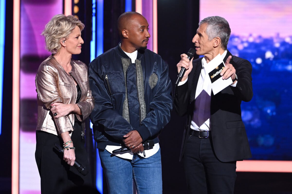 Photo : Sophie Davant et Soprano et Nagui - 35 ème édition du Téléthon sur France 2 à Paris le 5 ...