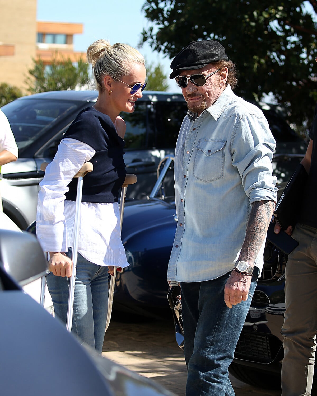 Photo : Johnny Hallyday avec sa femme Laeticia, qui marche toujours ...