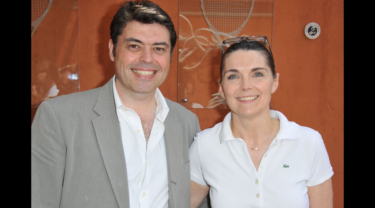 Photo : Marie-Claire Restoux et son mari au tournoi de Roland-Garros, à ...