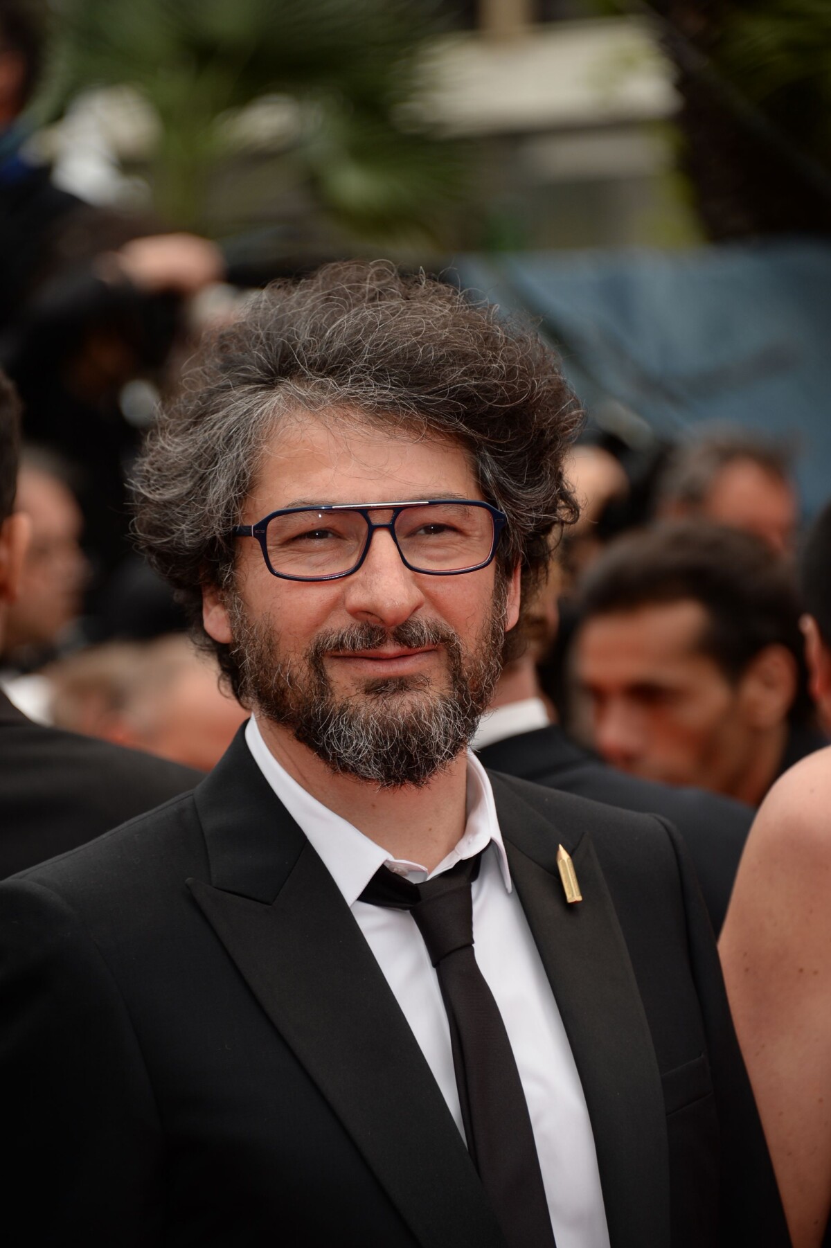 Photo : Radu Mihaileanu à la montée des marches de Foxcatcher, à l ...