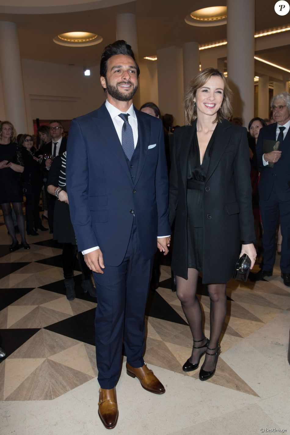 Maxim Nucci et sa compagne Isabelle Ithurburu (enceinte) - Arrivées ...