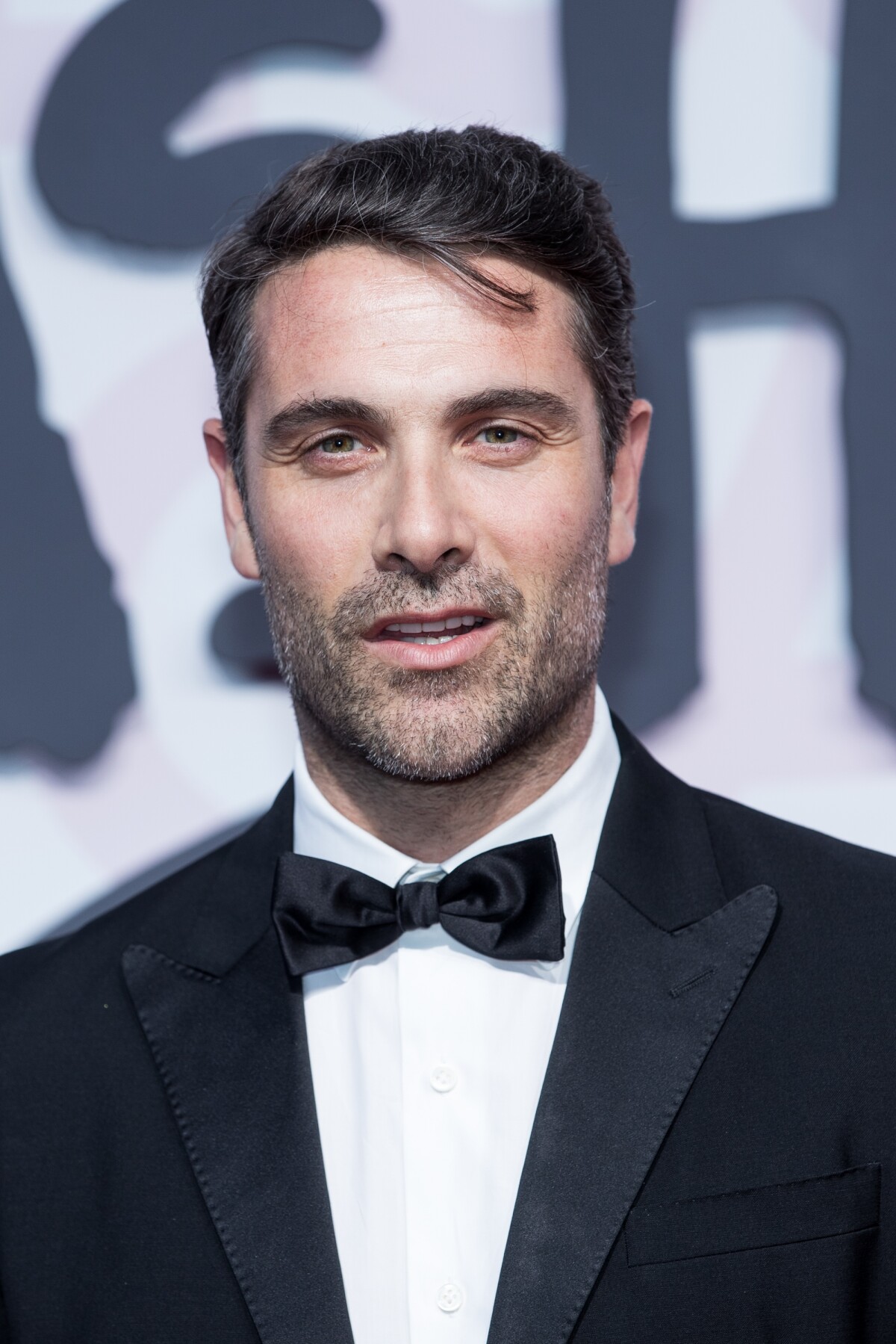 Photo : Luca Calvani lors du photocall du défilé de mode "Fashion For ...