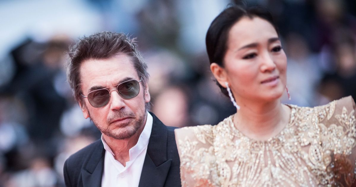 Jean-Michel Jarre et sa compagne Gong Li (robe Elie Saab)- Montée des ...